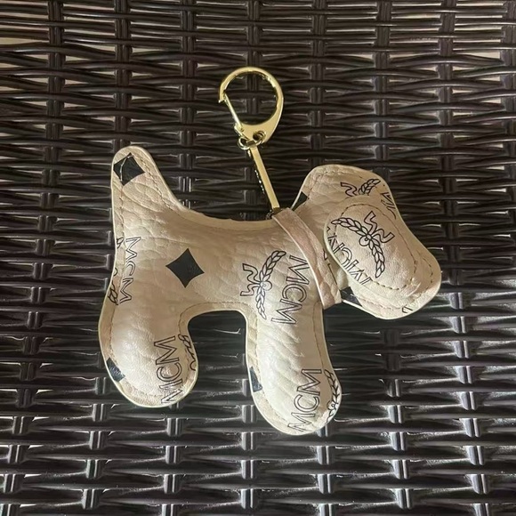 MCM | Accessories | Mcm Beige Dog Keychain | Poshmark